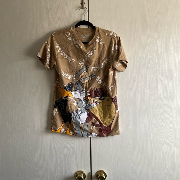 Warner Bros. | Tops | Tan Looney Tunes Top Worn A Few Times Has A Rip ...